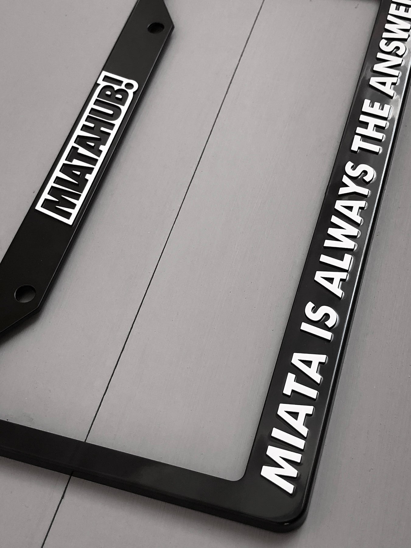 Miata Hub License Plate Frame – RUBADUB MEDIA
